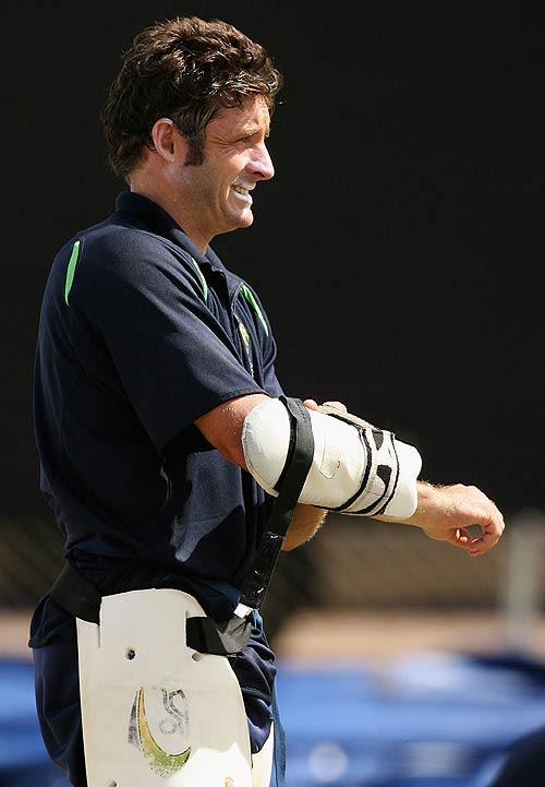 Michael Hussey makes sure he is well protected | ESPNcricinfo.com