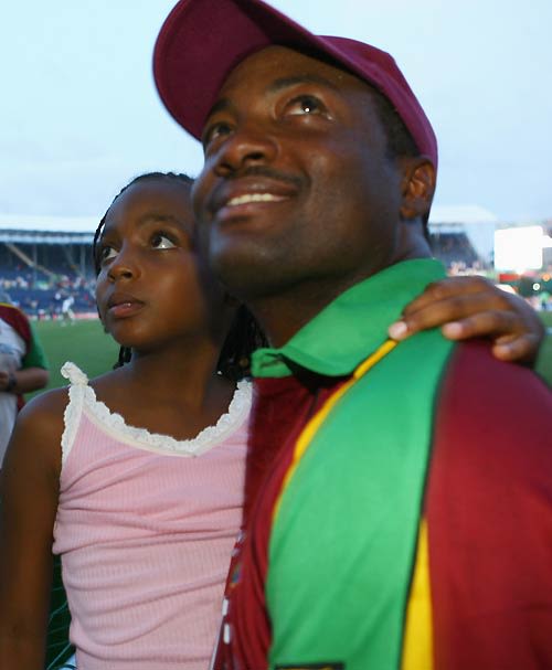 Brian Lara does a lap of honour with his daughter Sydney for company ...