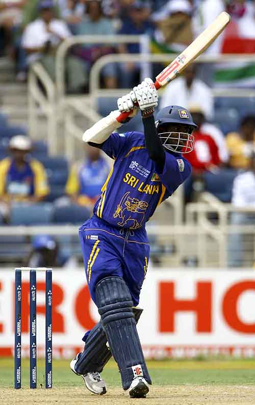 Upul Tharanga drives on his way to his third fifty of this World Cup ...