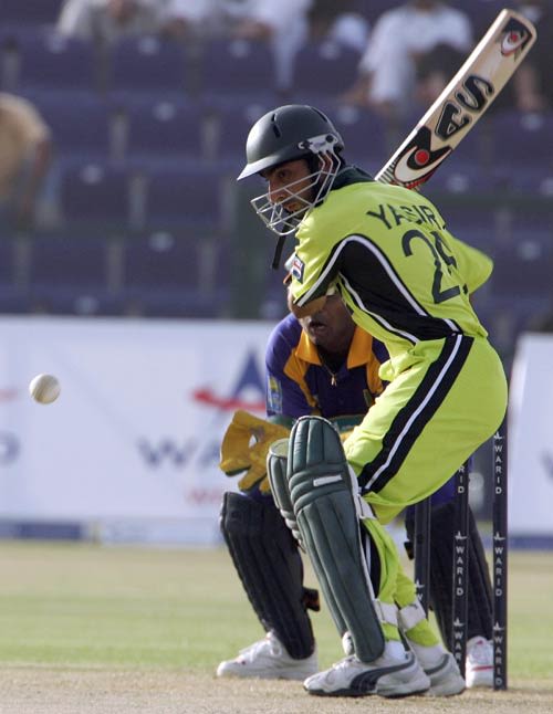 Yasir Hameed prepares to cut | ESPNcricinfo.com Yasir Hameed prepares to cut | ESPNcricinfo.com