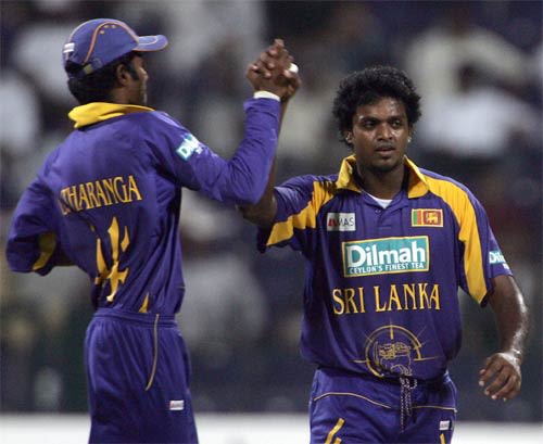 Dilhara Fernando celebrates a wicket with Upul Tharanga | ESPNcricinfo.com