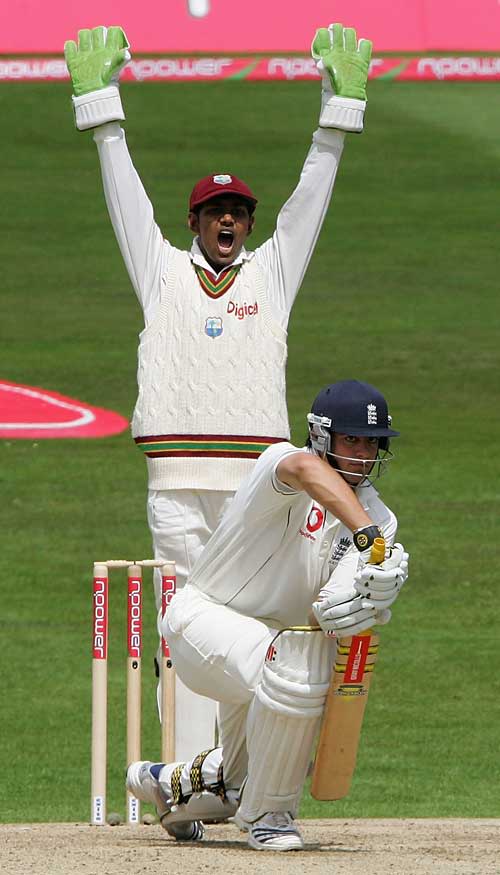 Alastair Cook plays forward but is still given out lbw to Chris Gayle ...
