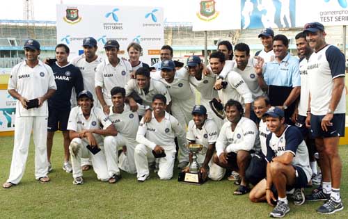 The Indian team pose as a group after sealing the series win against ...