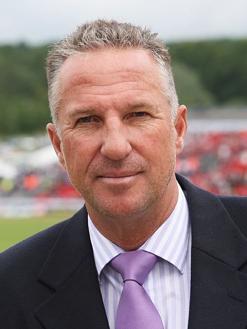 Ian Botham poses for the cameras on the day he was knighted ...