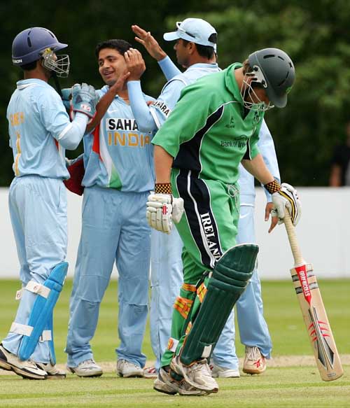 Gary Wilson begins his walk back to the pavilion after missing Piyush ...