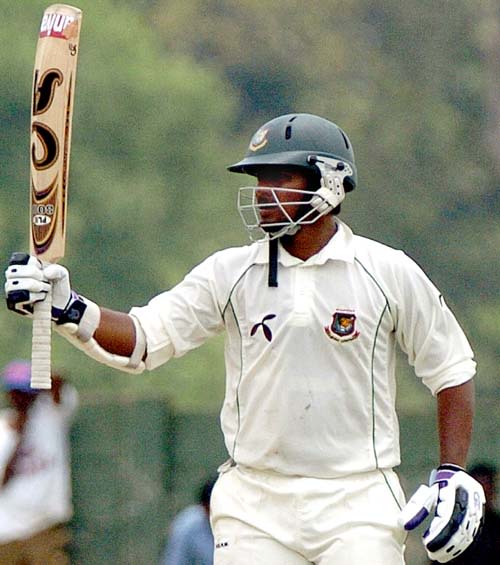 Shahriar Nafees acknowledges the cheers after reaching his fifty ...