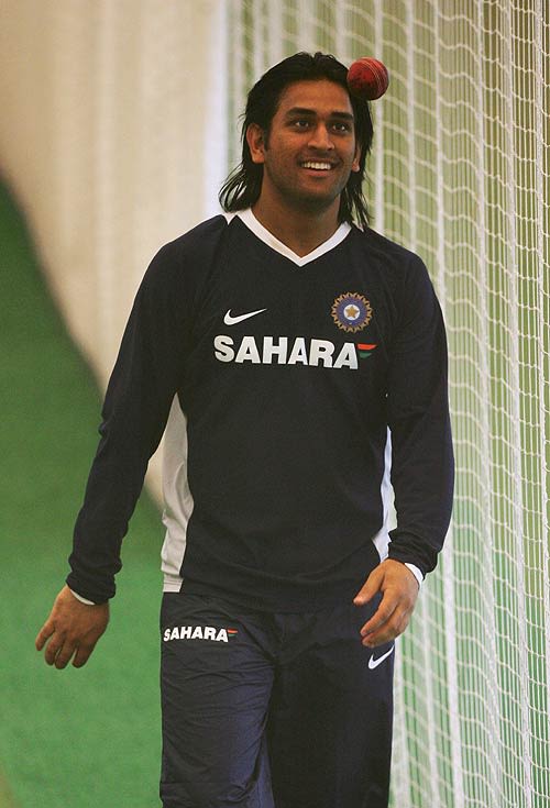 Mahendra Singh Dhoni tries his luck with the ball during the net ...