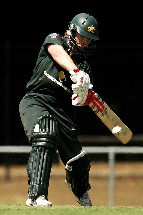 Karen Rolton drives through the off side en route to her unbeaten 81 ...