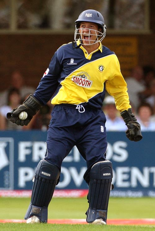 Steve Adshead is delighted after the run out of Andrew Flintoff ...