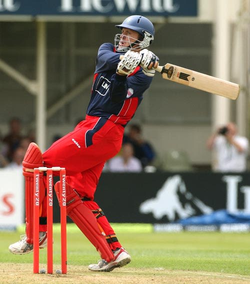 Dominic Cork hooks during his unbeaten 23 late in the innings ...