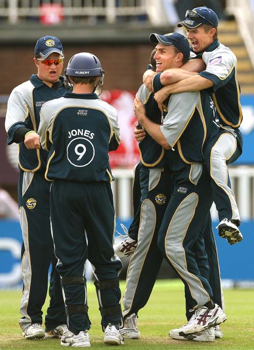 Kent players celebrate after Chris Adams was run out | ESPNcricinfo.com