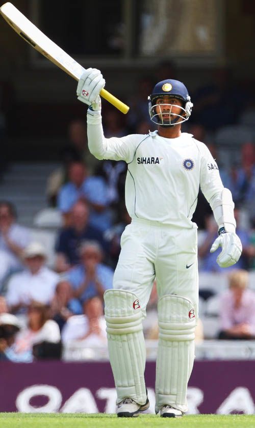 Dinesh Karthik acknowledges the cheers following his fifty ...