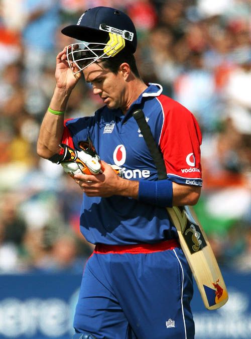 Kevin Pietersen of England walks back after being dismissed for nine ...