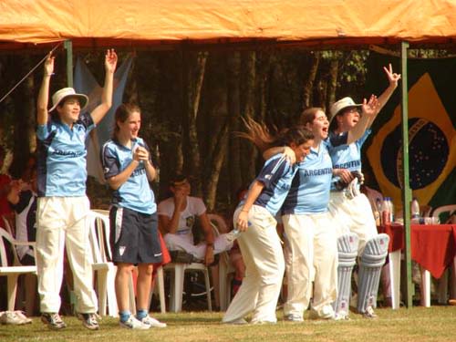Argentina celebrate a 4-wicket victory over Brazil | ESPNcricinfo.com