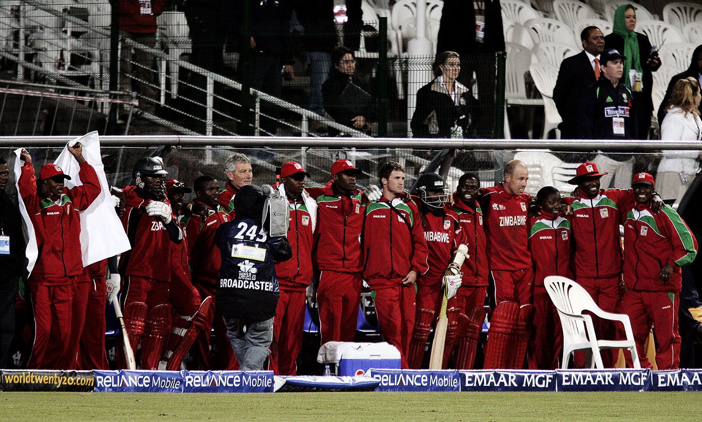 The Zimbabwe team stand at the boundary during the final moments of the ...