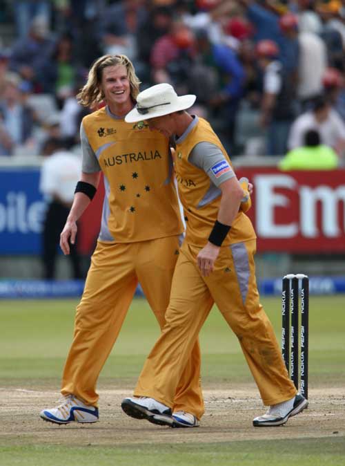 Brett Lee congratulates Nathan Bracken after the dismissal of Stuart ...