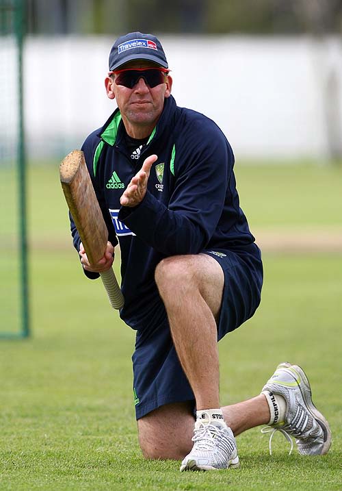 Tim Nielsen, the Australian coach, takes charge at a nets session ...
