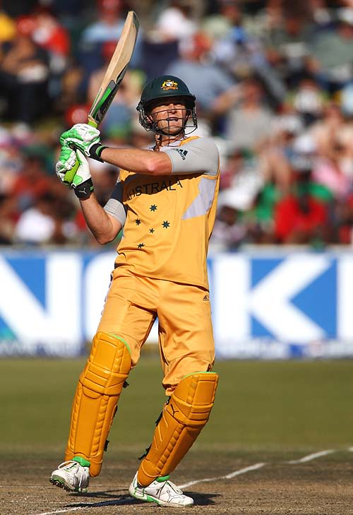 Adam Gilchrist watches as the ball sails into the stands | ESPNcricinfo.com