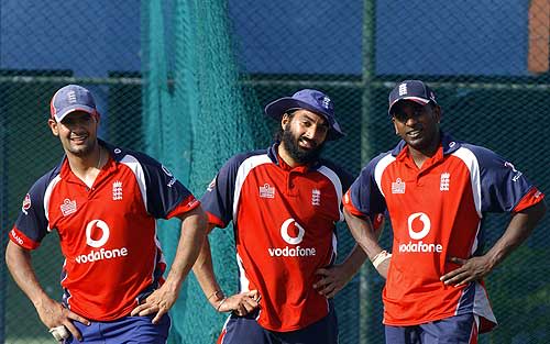 Owais Shah, Monty Panesar and Dimitri Mascarenhas look on during fielding practice ...