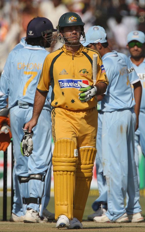 Ricky Ponting walks off after the third umpire adjudicated against his ...