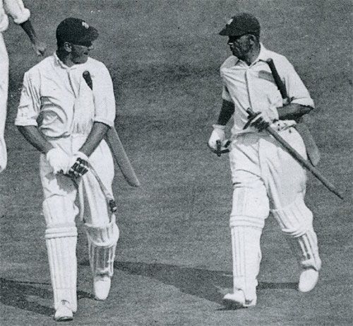 Wally Hammond and Bob Wyatt head off after winning the fifth Test ...