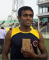 Dhaka's Mehrab Hossain jnr poses with his Man-of-the-Match trophy | ESPNcricinfo.com