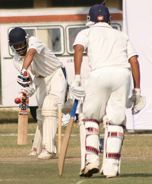 Ian Dev Singh defends a delivery during his 104 | ESPNcricinfo.com