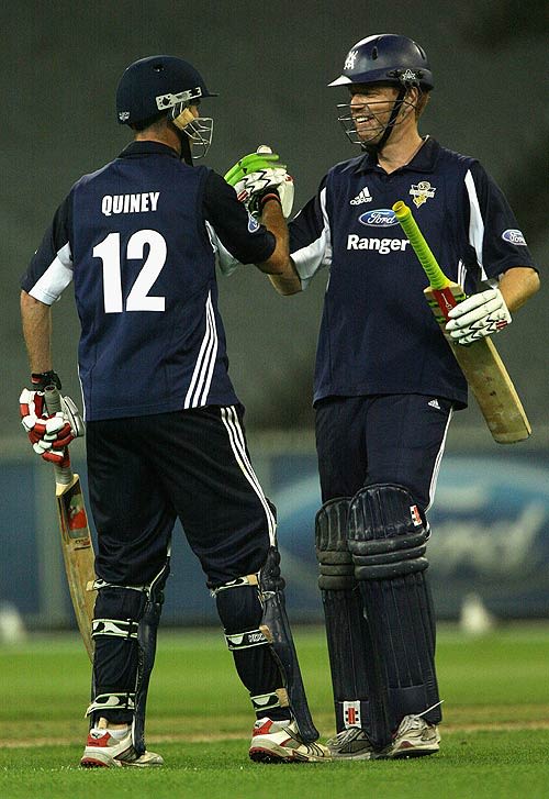 Andrew McDonald congratulates the Man of the Match Rob Quiney on the ...