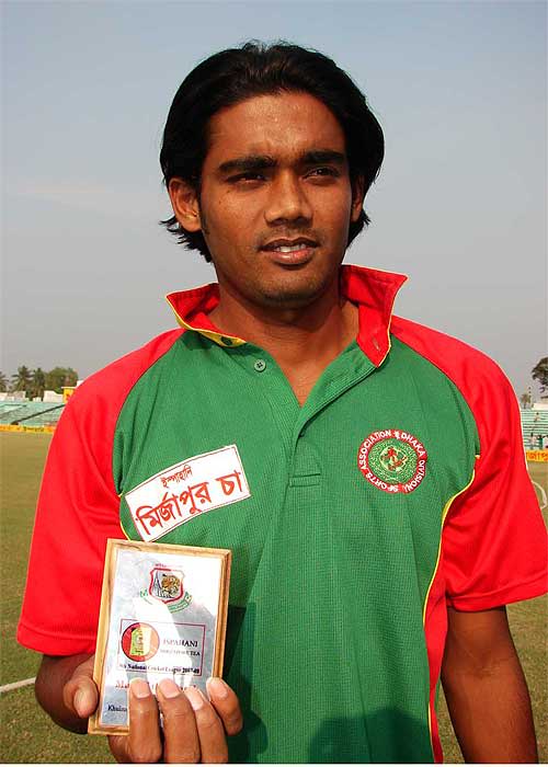 Dhaka's Mahbubul Alam poses with his Man-of-the-Match award ...