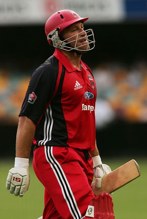 Shane Deitz walks back after being caught off James Hopes for 32 ...