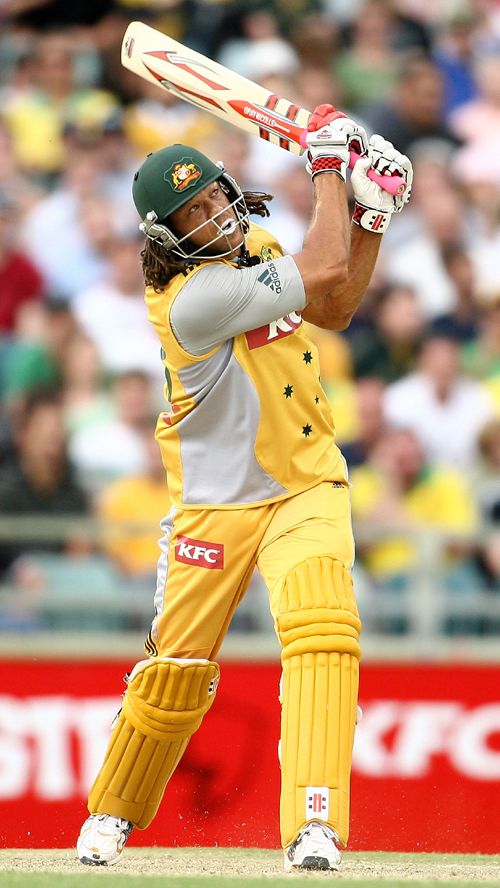 Andrew Symonds biffs the ball over long-on during his unbeaten 85 ...