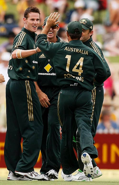 Shaun Tait celebrates after pulling Australia back into the contest ...