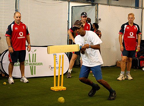 Peter Moores watches a young Sri Lankan bat during a 'Cricket Against ...