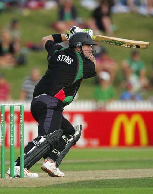 Scott Styris drives the ball through the covers during his 29 ...
