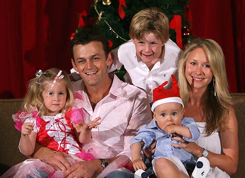 Adam Gilchrist with wife Mel and children Annie, Harry and Archie ...