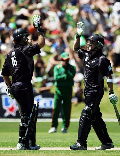 Brendon McCullum and Jamie How celebrate their 10-wicket win against ...