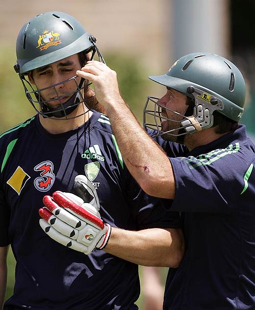 Mitchell Johnson gets some assistance from his captain at training ...