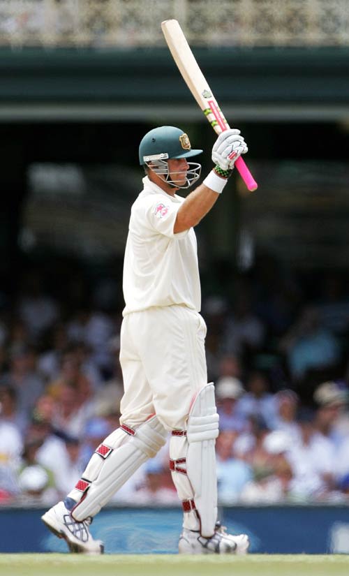 Matthew Hayden acknowledges the applause after reaching his half ...