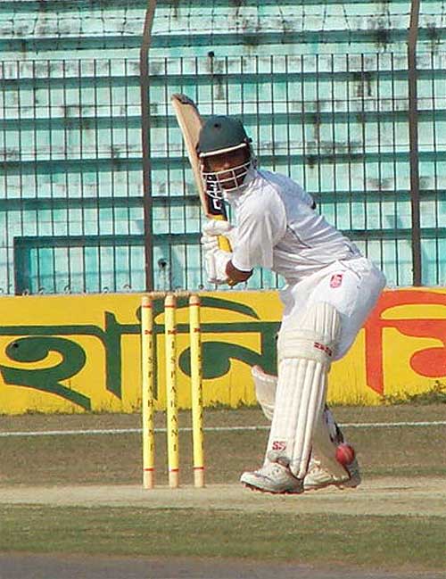 Fariduddin prepares to drive en route his 61 | ESPNcricinfo.com