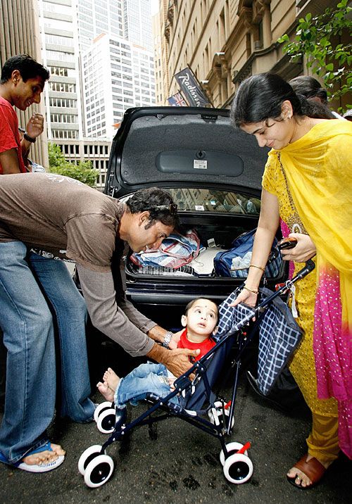 VVS Laxman with his son and wife outside the India team hotel ...