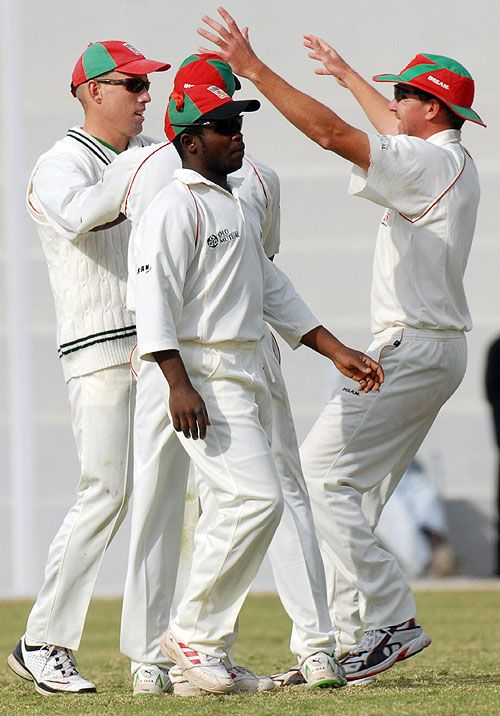 The Zimbabweans celebrate a wicket on a tough day | ESPNcricinfo.com