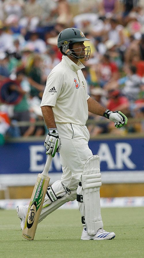 Ricky Ponting walks back after being caught at slip off Ishant Sharma | ESPNcricinfo.com