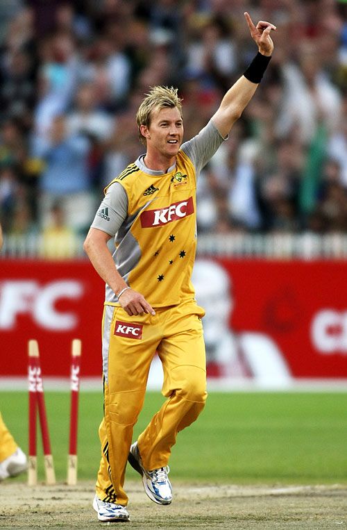 Brett Lee celebrates after knocking over Dinesh Karthik's stumps ...