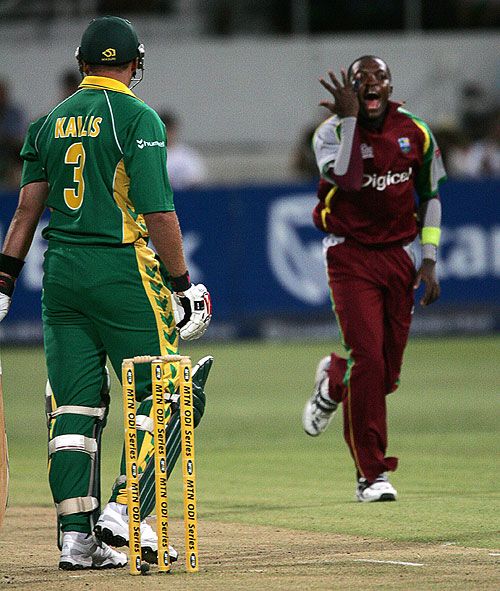 Fidel Edwards celebrates as Jacques Kallis slices to gully ...
