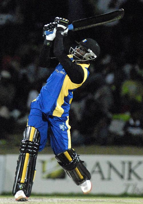 Barbados' Jonathan Carter lofts during his 61 | ESPNcricinfo.com