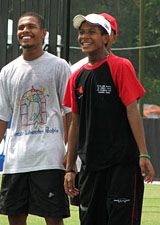 Colin and Charles Amini at a training session | ESPNcricinfo.com