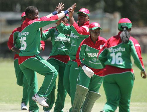 Zimbabwe's players celebrate a wicket | ESPNcricinfo.com