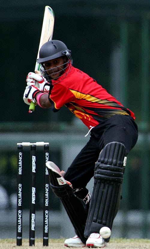 Arua Dikana winds up to play a shot | ESPNcricinfo.com