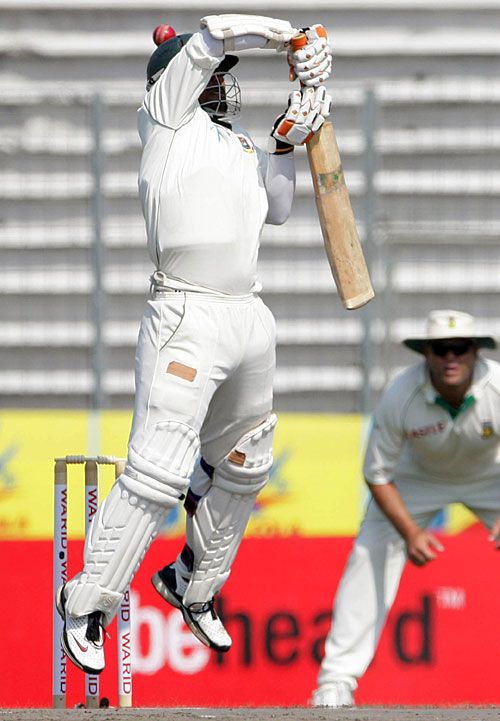 Shahriar Nafees fends off a short ball | ESPNcricinfo.com