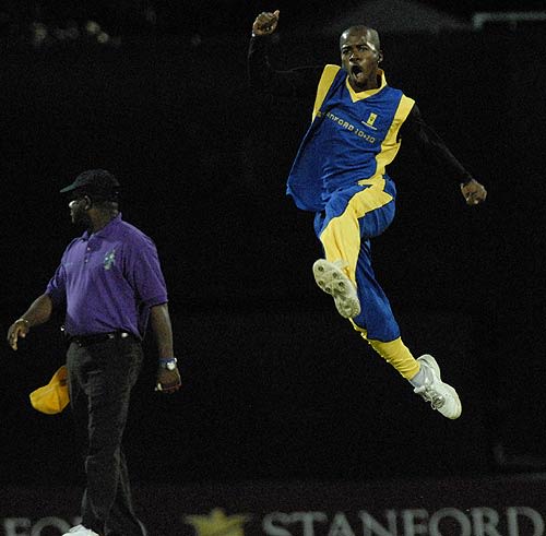 Derrick Bishop celebrates the dismissal of William Perkins ...